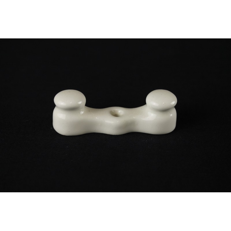 Double ceramic cable tension insulator for exposed electrical system